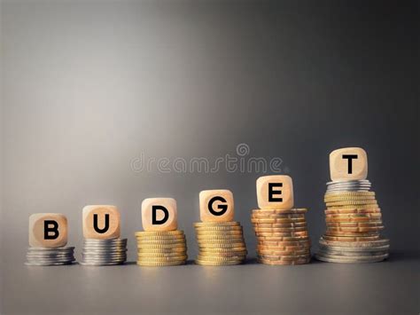 Finance And Economy Concept Budget Text On Wooden Cubes Background