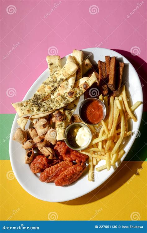 Deep Fried Chicken Wings French Fries Breadsticks Tomato Sauce