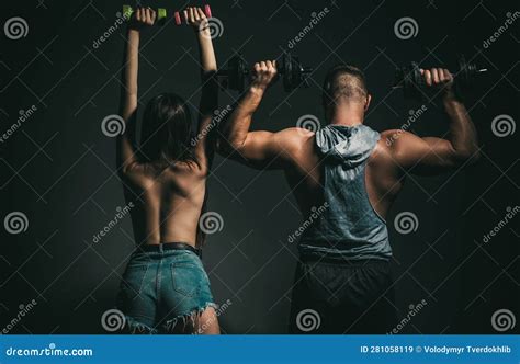Brutal Couple Exercising With Dumbbells Together Strong Fit Body