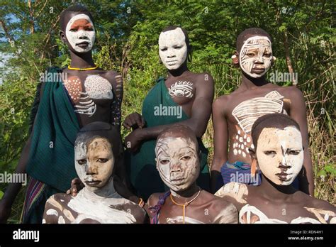 Group Of Surma Woman With Facial And Body Paintings Kibish Omo River