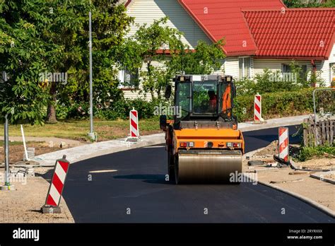 Construction Site Is Laying New Asphalt Pavement Stock Photo Alamy