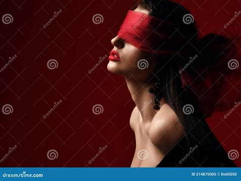 Profile Of Excited Brunette Woman With Naked Shoulders And Breast Holds