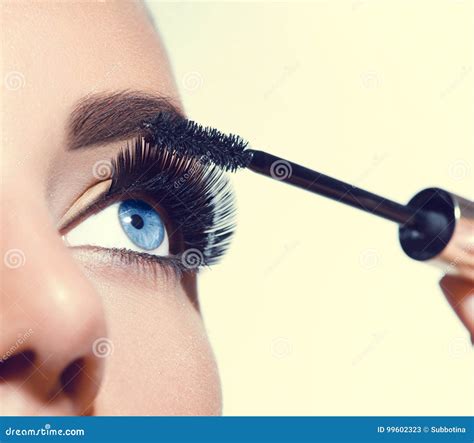 Long Lashes Closeup Beautiful Woman Applying Mascara On Her Eyes Stock