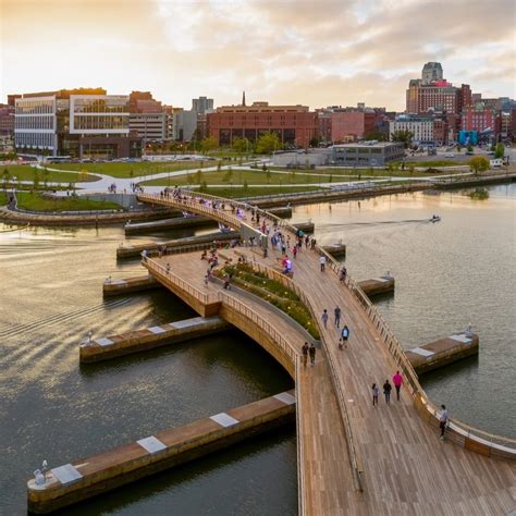 Curved Pedestrian Bridge Links Two Riverfront Parks In Providence
