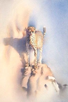 A Cheetah Standing On Top Of A Snow Covered Mountain