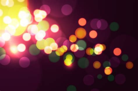 Efeito de luzes bokeh em fundo escuro Vetor Grátis