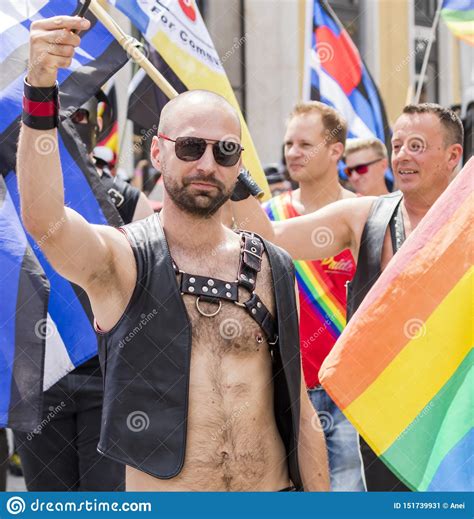 An Almost Naked Gay Man Wearing Leather Harness Attending The Gay Pride