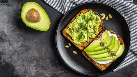 The Creamy Cheesy Addition You Should Try On Avocado Toast
