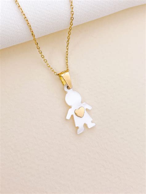 Dije niño nácar oro Joyería Petunia