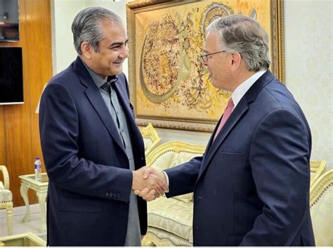 Federal Minister For Interior Mohsin Naqvi Presenting Souvenir To US
