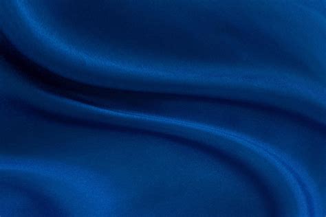 Luxury Deep Blue Fabric Background Smooth Wavy Fold Pattern Elegant