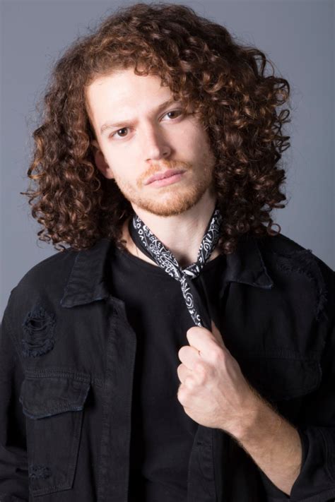 Long Thick Curly Hairstyles For Men