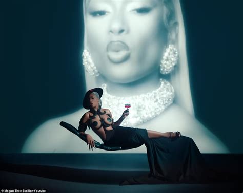 Megan Thee Stallion Is Nearly Naked In Silver Chains And Sheer Catsuit