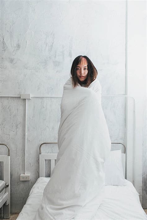 Young Woman Wrapped In Bed Sheet By Stocksy Contributor Lumina Stocksy