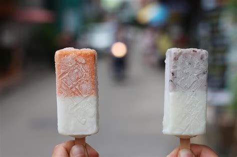 Premium Photo Cropped Hands Holding Flavoured Ice