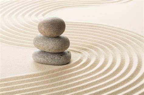 Free Photo Stacked Zen Marble Stones Sand Background In Mindfulness