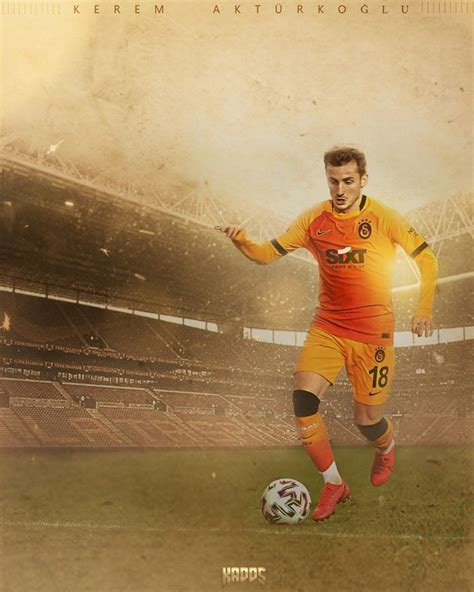 A Man In An Orange And Yellow Uniform Is Kicking A Soccer Ball On The Field