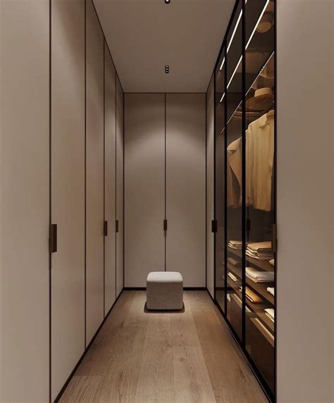 An Empty Room With Many Closets And Shelves Filled With Books On The Wall