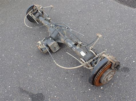 MOST DYFER BELKA OŚ ZAWIESZENIA TYŁ TARCZ MAN TGE VW CRAFTER II 7C 2N0