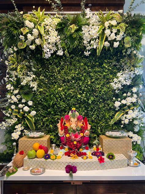 Ganpati Decoration At Home Very Beautiful Green Wall And White Flowers
