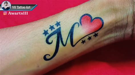 Letter M Heart Tattoo