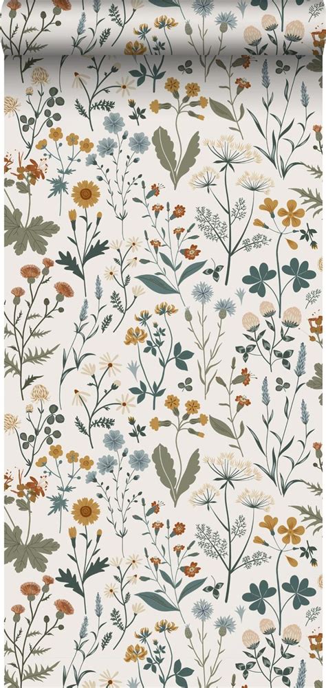 Ce papier peint à motif de fleurs des champs en jaune ocre vert grisé