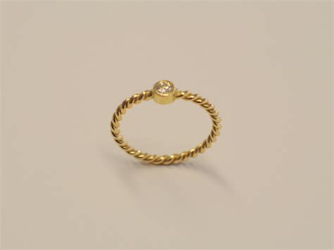 Kordelring 750 Gelbgold mit Brillant im höllwerk Shop bestellen