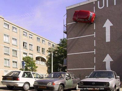 Car Parked On Side Of Building