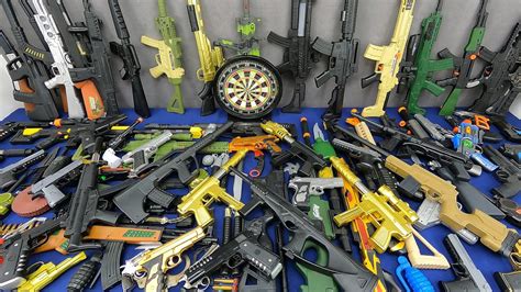 Dozens Of Toy Realistic Pistols And Rifles Capsule Exploding Toy
