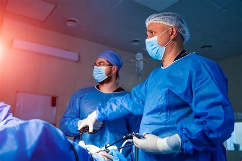 Premium Photo Surgeons Performing Surgery In Operating Theater Hospital