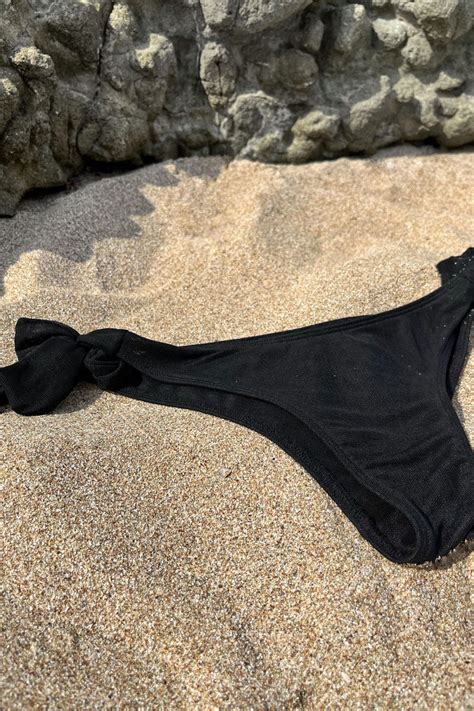Tan Through Bikinis A Bikini With A Special Fabric That Allows Sunlight To Pass Through See
