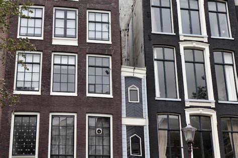 Holanda ámsterdam la fachada de antiguas casas de piedra privadas en