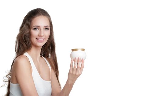 Premium Photo Beautiful Woman Holding Jar Of Cosmetic Cream And