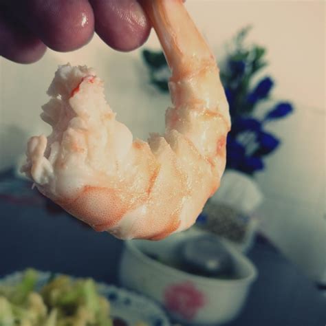 Premium Photo Cropped Hand Holding Shrimp