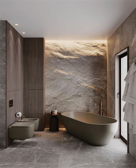 A Modern Bathroom With Stone Walls And Flooring