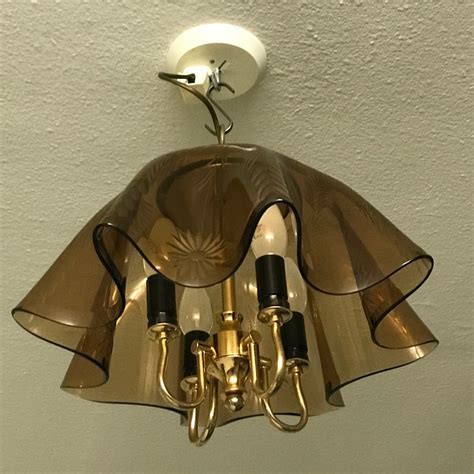 Se produkter som liknar Vintage taklampa eldbrunt tra på Tradera