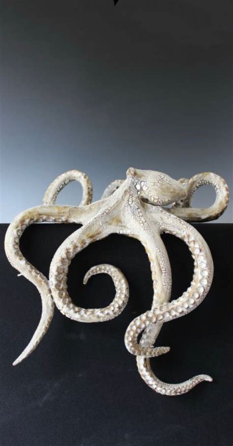 An Octopus Sculpture Sitting On Top Of A Table