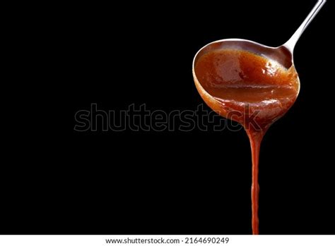 Pouring Chili Sauce Isolated On Black Stock Photo 2164690249 Shutterstock