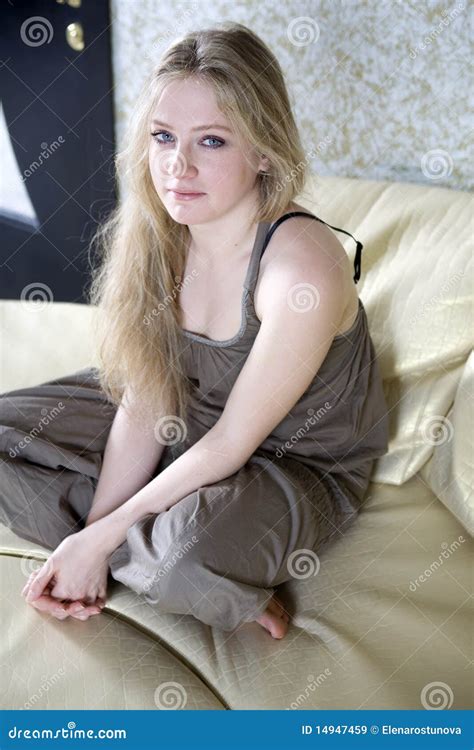 Sad Blond Lonely Teen Girl Sitting On Sofa Stock Image Image Of Bedroom Dreamer 14947459
