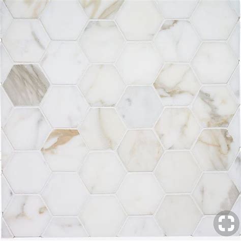 White Marble Hexagon Tiles With Gold Accents For Kitchen Backsplash