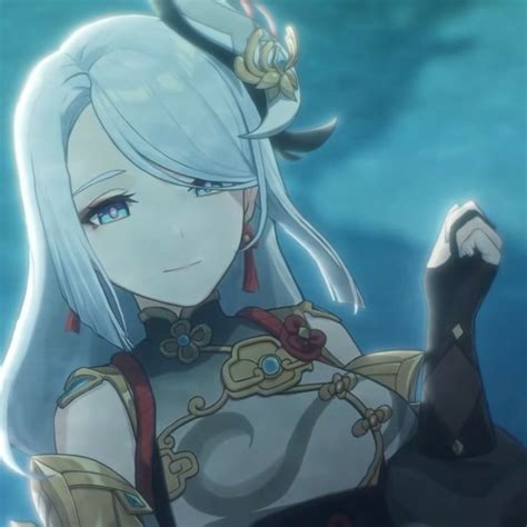 An Anime Character With Long White Hair And Blue Eyes Holding Her Arm