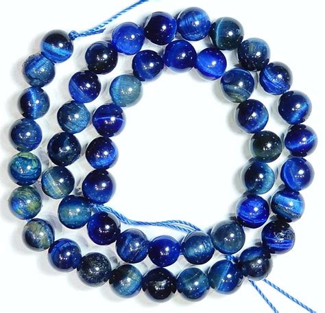 1 Strang echte schöne blaue Tigeraugen Perlen 8 mm Kaufen auf Ricardo