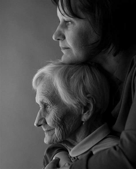 Nurse Helps Her Grandmother To Go To The Walker Caring For The