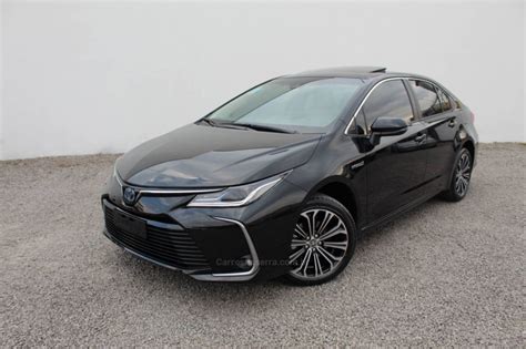 COROLLA 1 8 ALTIS PREMIUM 16V HIBRIDO 4P AUTOMATICO 2021 FLORES DA