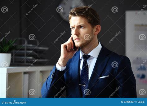 Handsome Businessman In Suit Speaking On The Phone Stock Image Image