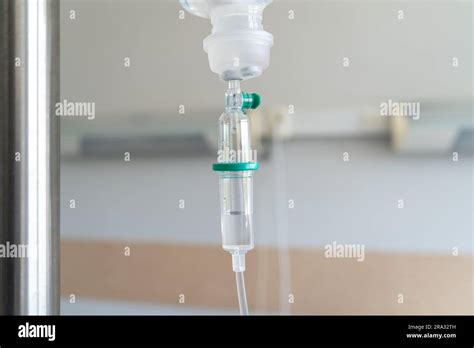 Infusion Bag With Drop Counter On A IV Stand Pole Or Bottle Hanger
