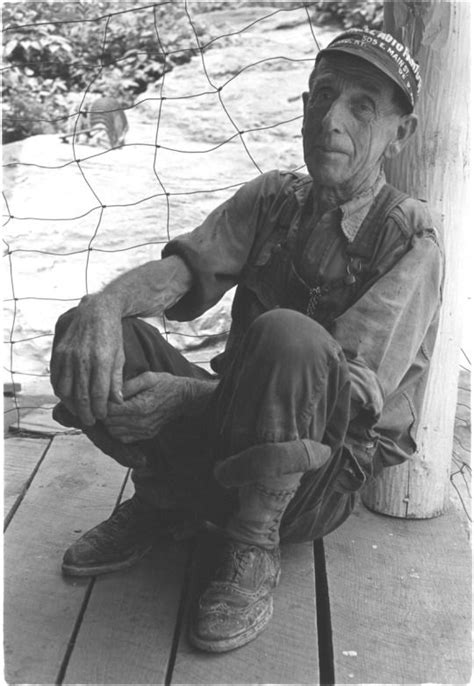 Man Leaning Back Against Wooden Pole Eastern Kentucky William