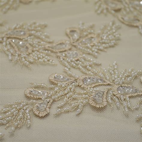 Tissu tulle brodé perlé champagne Tissus en Ligne