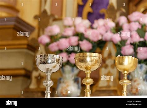 Chalice And Ambula On The Altar Moment Of The Holy Mass Consecration