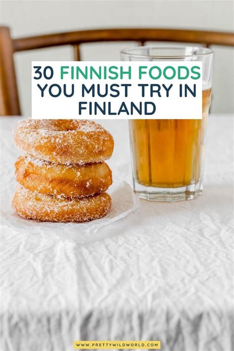 Three Donuts And A Glass Of Beer On A Table With The Words Finnish